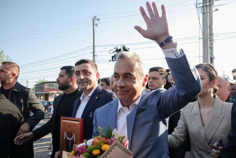 Romanian presidential vote favourite says he will bring back banned far ...
